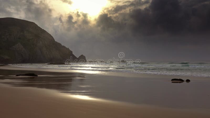 Reflection on Sandy Beach and Rocks and Cloudy Sky Stock Video - Video ...