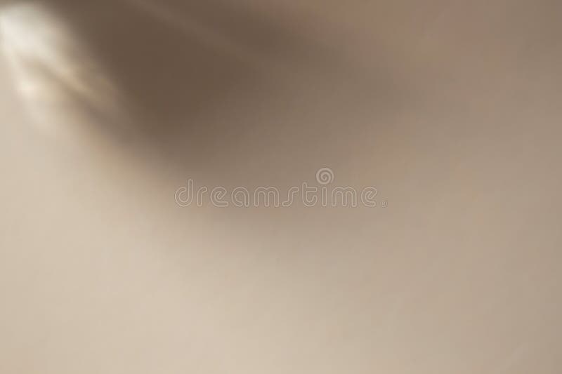 Reflection of Scattered Rays of Light with Shadow on a Gray-beige Wall ...