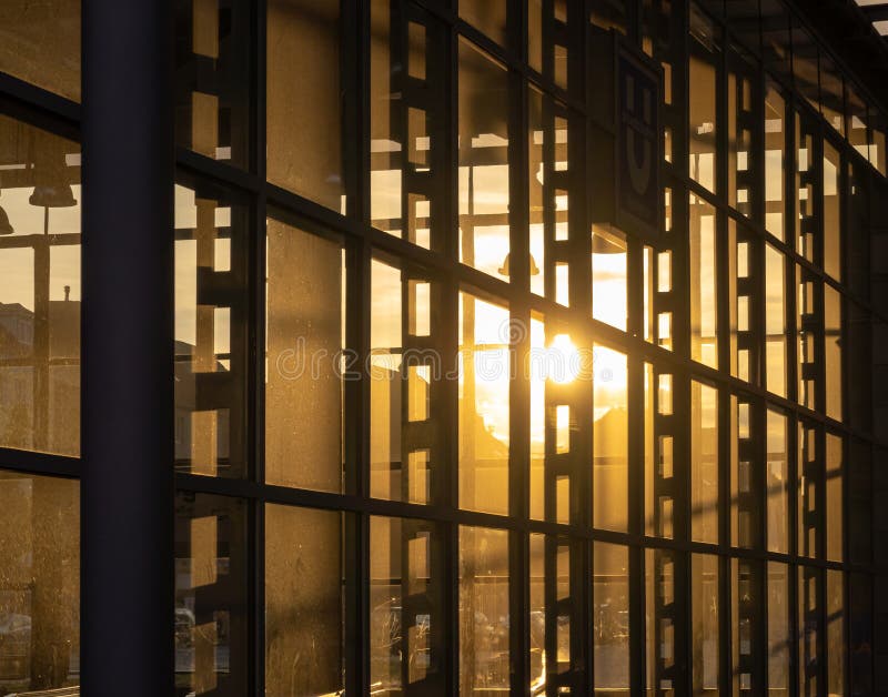 Reflection of the Setting Sun in the Fully Glazed Facade of a Hi Stock ...