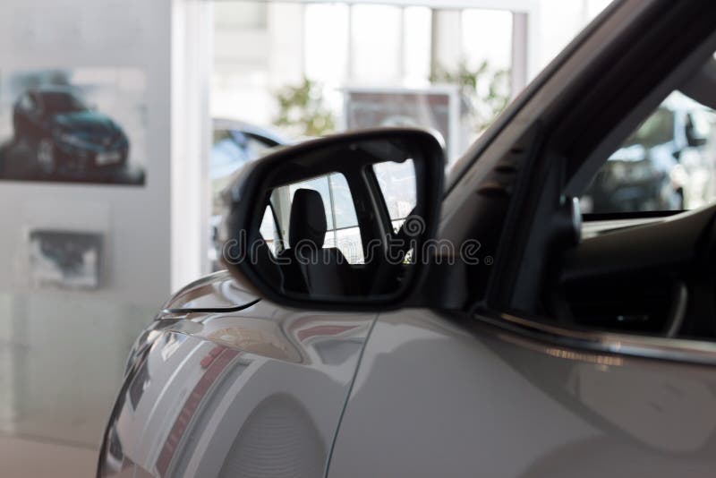 Reflection in Side Mirror of the Interior of the New Car. Stock Photo ...