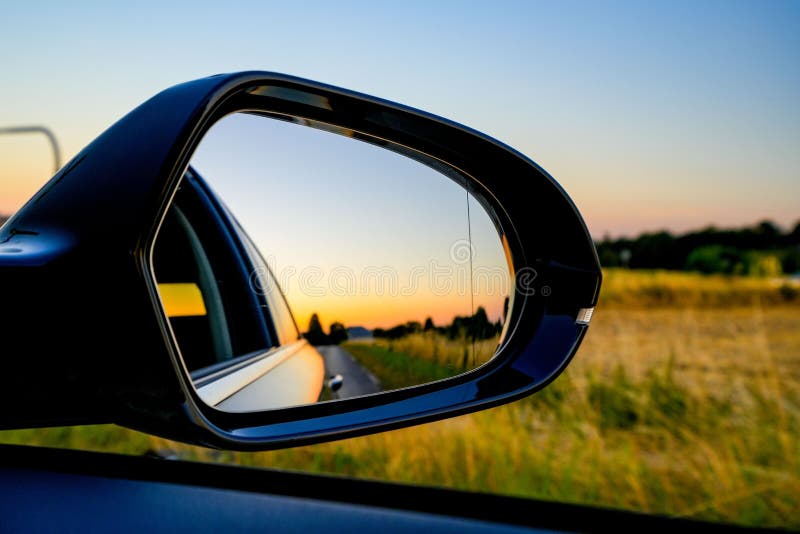 Reflection in the Side-view Mirror of a Car Stock Image - Image of ...