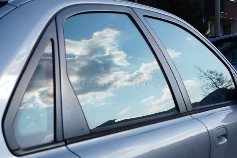 Reflection of the Sky and Clouds in the Window of a Car. Blue Sky. the ...