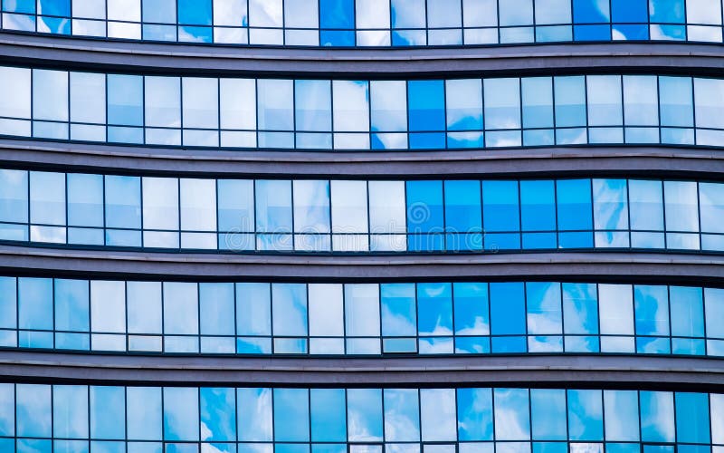 Reflection of Sky in Glass Facade of Office Building Stock Photo ...