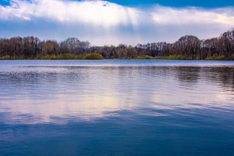 Sky reflection in water stock photo. Image of dawn, daylight - 145528670