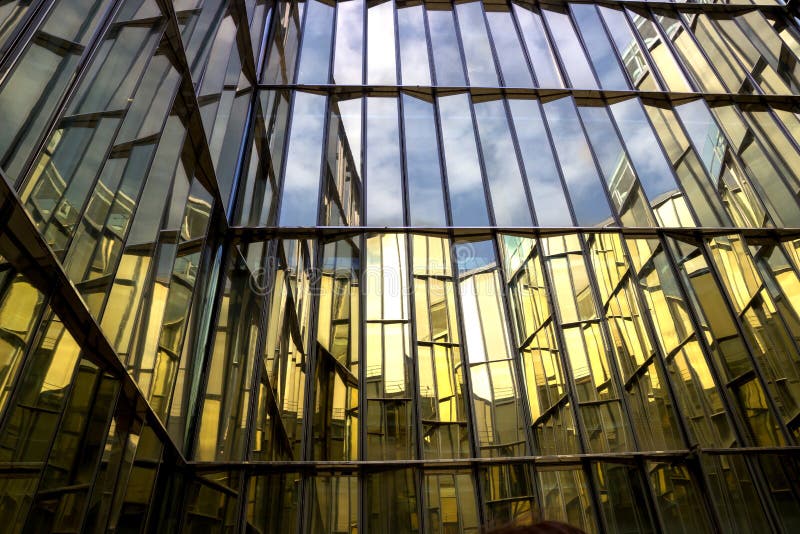Reflection of the Sky and Other Buildings in the Mirror Wall of a ...