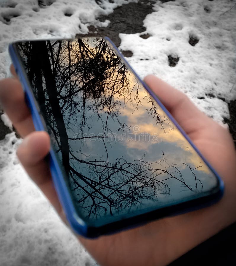 Reflection of Sky on Phone Holding in Hand Stock Image - Image of ...