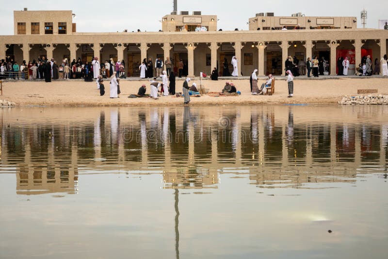 Reflection of the Sky and the Qatari Flag on a Lake during National Day ...