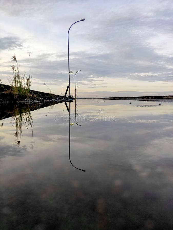 Reflection of the Sky in the Water this Morning Stock Image - Image of ...