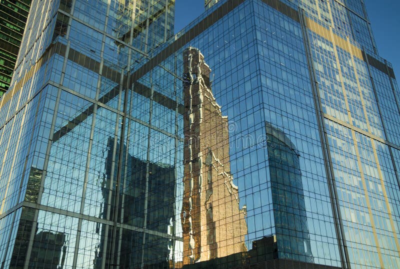 Reflection of Skyscrapers in the Windows of the Towers. Stock Photo ...