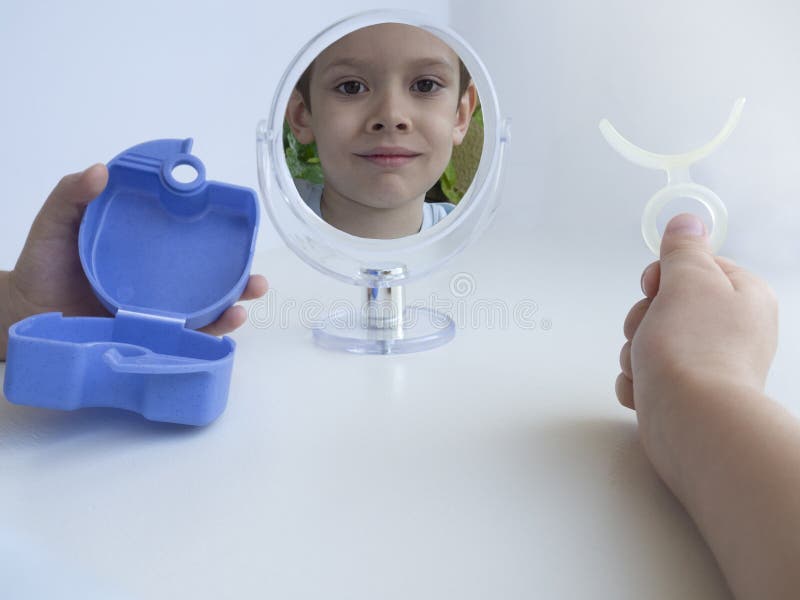 Reflection of Smiling Face of 5-year-old Boy in Mirror,his Hands ...