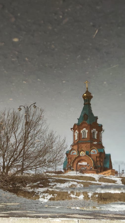 Reflection in the Spring Puddle of an Orthodox Church. Spring Stock ...