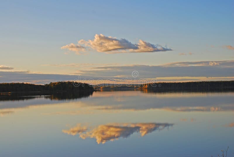 Reflection on still lake stock photo. Image of mirror - 3327760