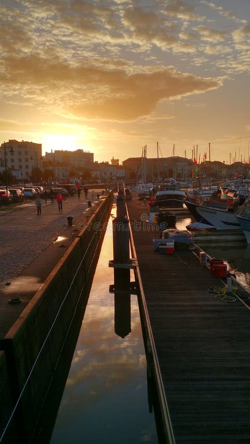 Reflection of Sun in Beautiful Port and Warm Ambiance Stock Photo ...