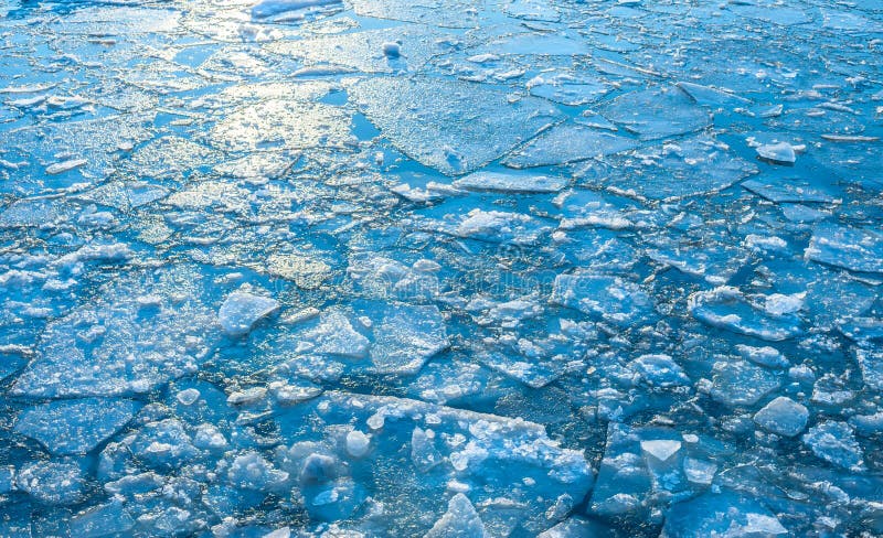 The Reflection of the Sun in Ice Formed in a River Stock Image - Image ...
