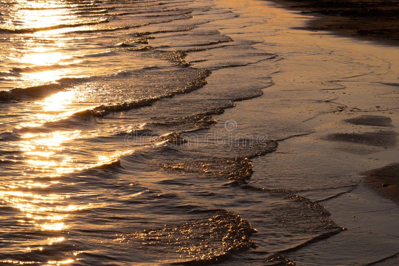 Reflection of Sun Rays in Small Waves Stock Image - Image of sunset ...