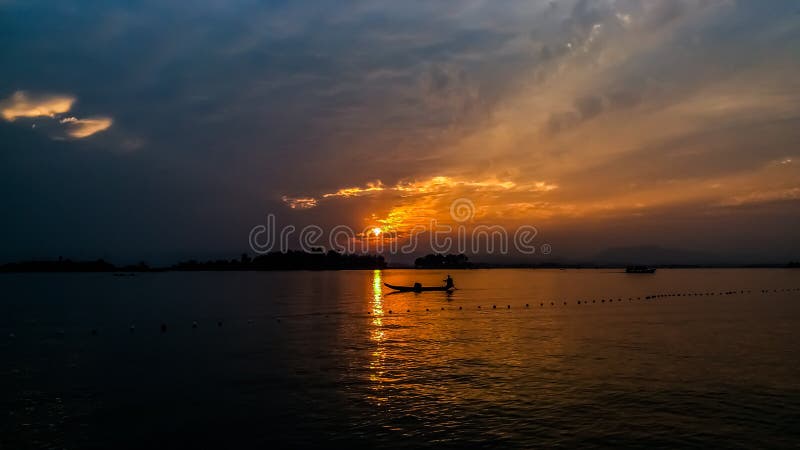 Reflection of Sun on the River Stock Photo - Image of dusk, shore ...