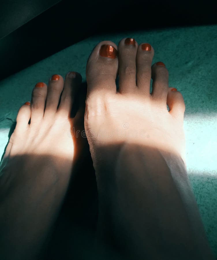 The Reflection of the Sun Touching My Feet in the Morning Stock Image ...