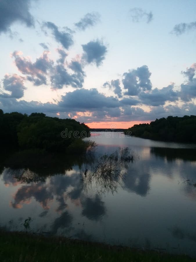 Reflection of Sunset and Clouds on Floud Water Stock Image - Image of ...