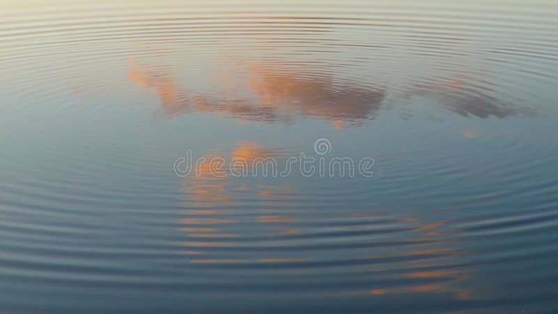 Reflection of Sunset Clouds in Quiet Water Stock Footage - Video of ...
