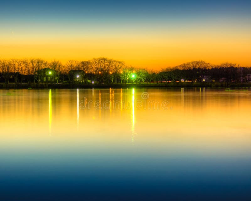 Reflection of Sunset Glow on the Park Pond Stock Image - Image of ...