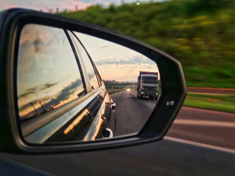 Reflection of Sunset in Side Mirror Stock Photo - Image of reflective ...