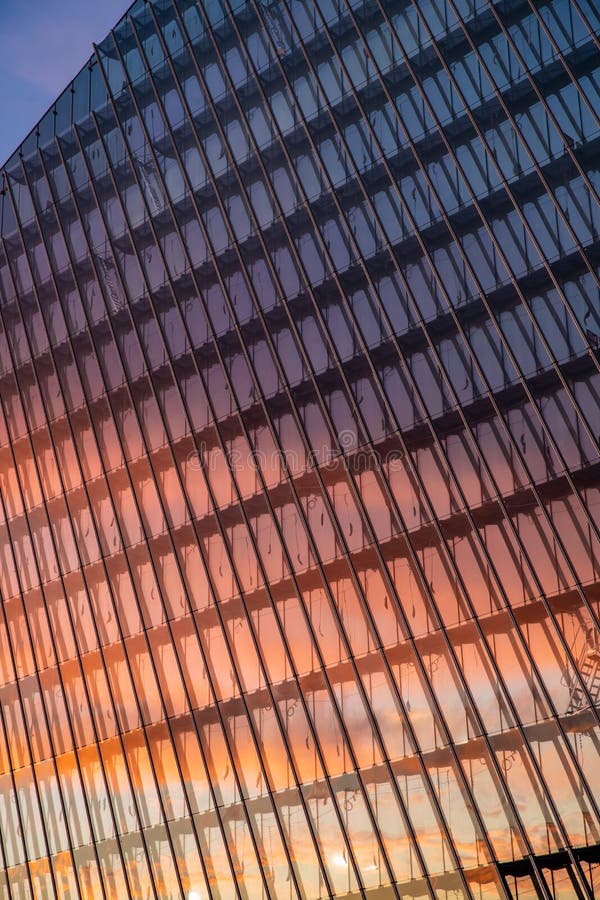 Reflection of the Sunset Sky in a Glass Facade of the Building ...