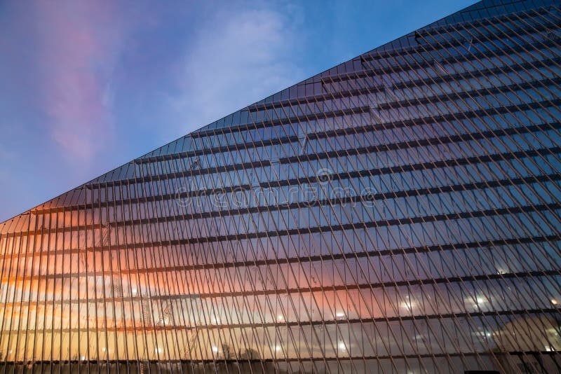 Reflection of the Sunset Sky in a Glass Facade of the Building ...