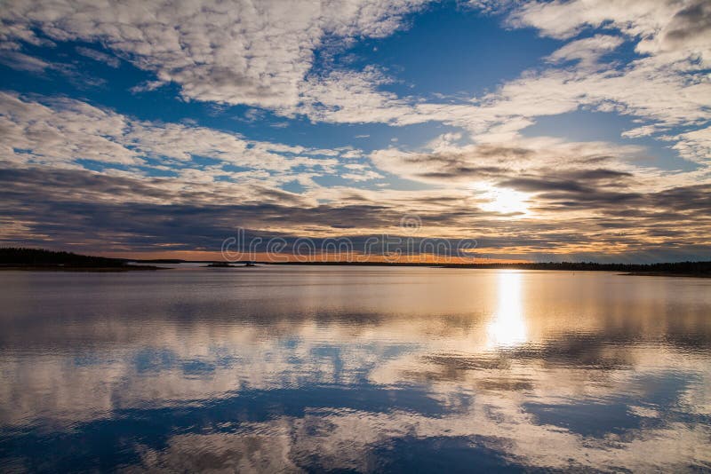 Reflection of the Sunset Sky in a Large Lake. Stock Image - Image of ...