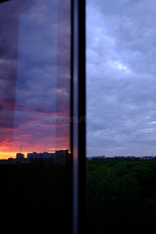 Reflection of the Sunset in the Windows of the House Stock Image ...