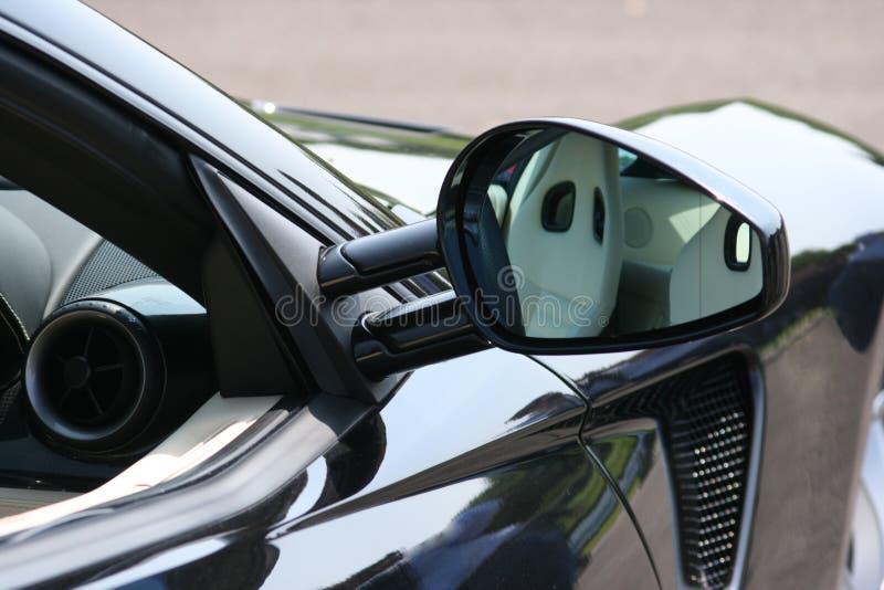 Reflection in Supercar Door Mirror Stock Photo - Image of leather ...