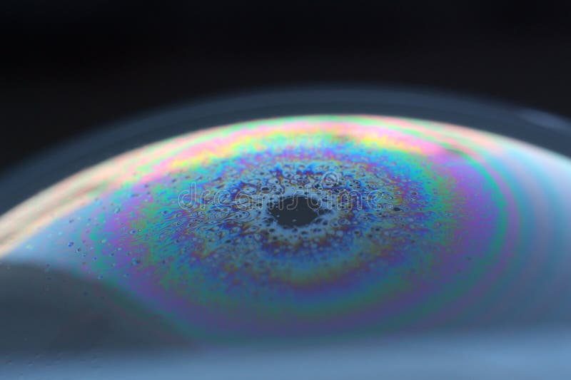 The Reflection on the Surface of a Soap Bubble Looks Like a Planet ...