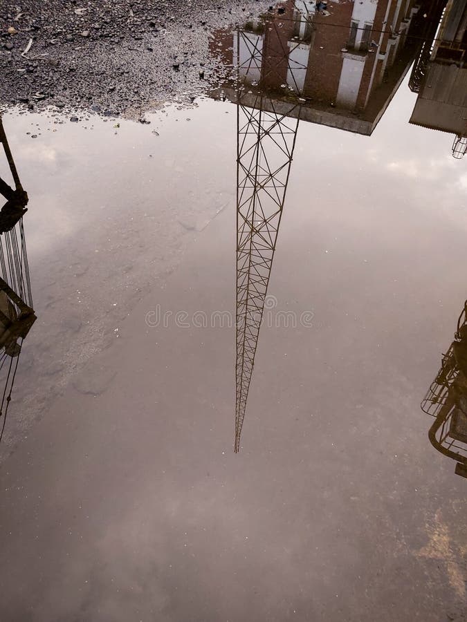 The Reflection of a Tower on Water. Stock Photo - Image of floor ...
