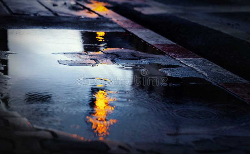 Reflection of Traffic Light in Puddle. Stock Image - Image of city ...