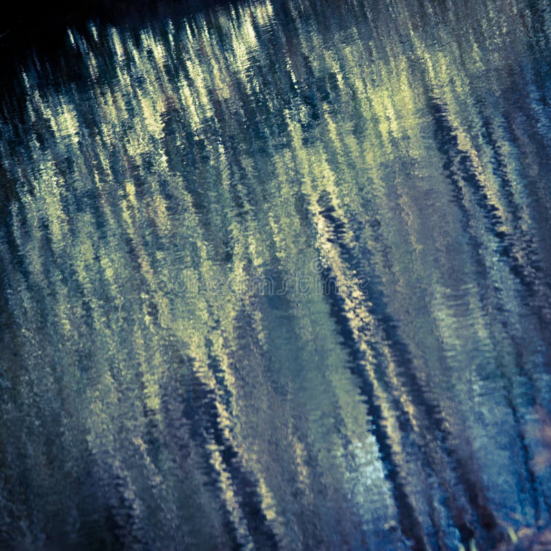 Reflection of Trees in Water Stock Image - Image of moving, diagonal ...