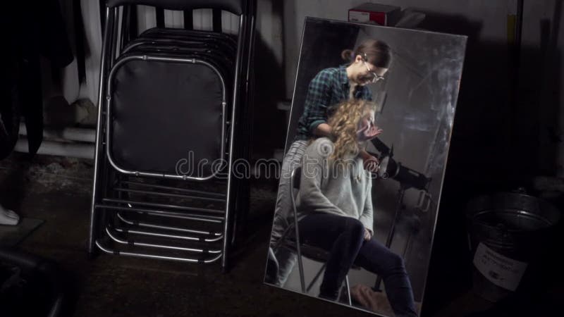 Reflection of Two Girls in a Mirror during a Photocall Stock Video ...