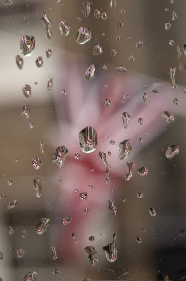 Reflection of Union Jack stock image. Image of rain, rainy - 79333245