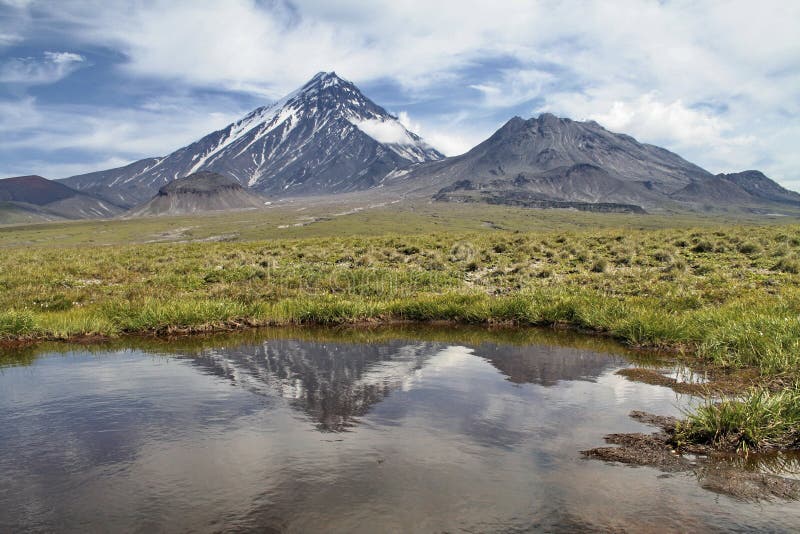 Reflection of the volcano stock image. Image of kamchatka - 130806107