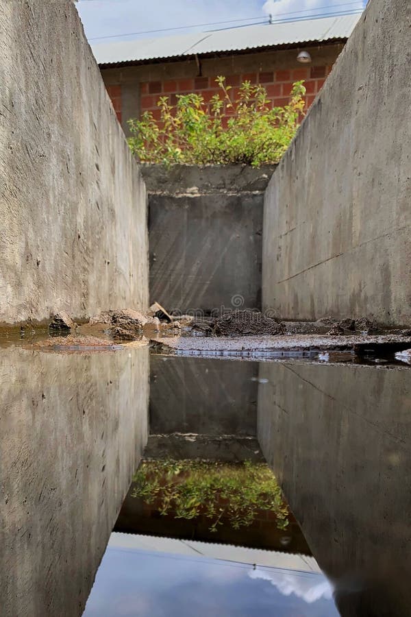 Reflection of Water in a Concrete Channel after the Rain. Stock Photo ...