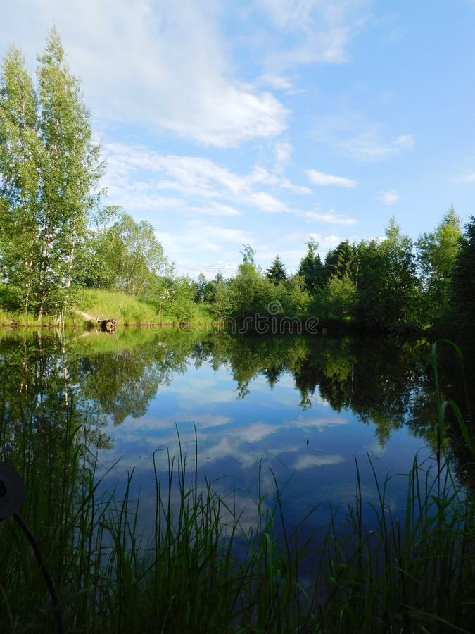 The Reflection in the Water. Stock Photo - Image of lake, blue: 55525644