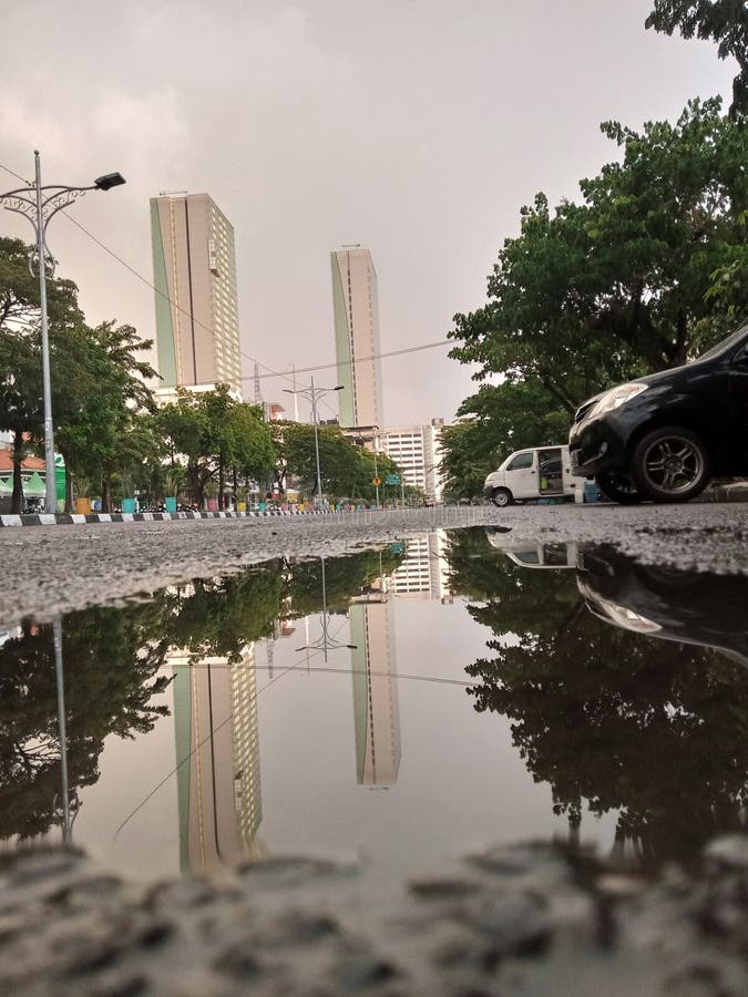 Reflection of the Water after Rain in the Morning Stock Image - Image ...