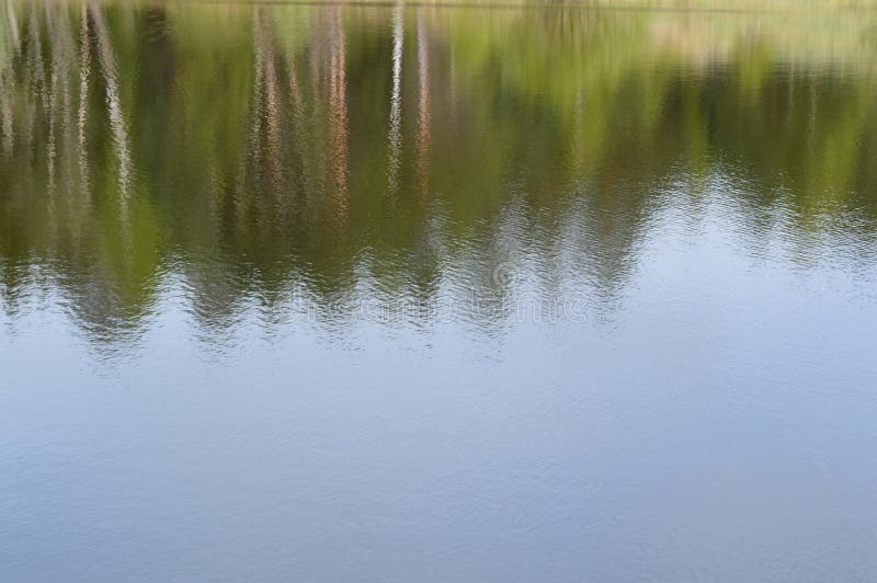 The Reflection on the Water Stock Photo - Image of texture, surface ...
