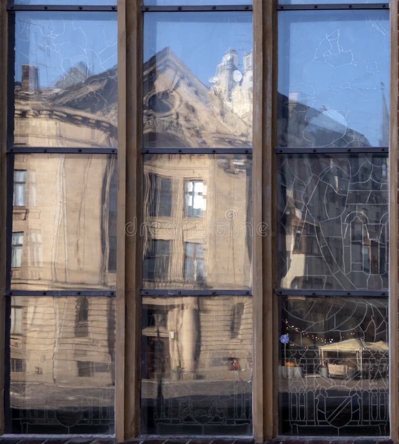 Reflection in the Window of an Old House Stock Photo - Image of town ...