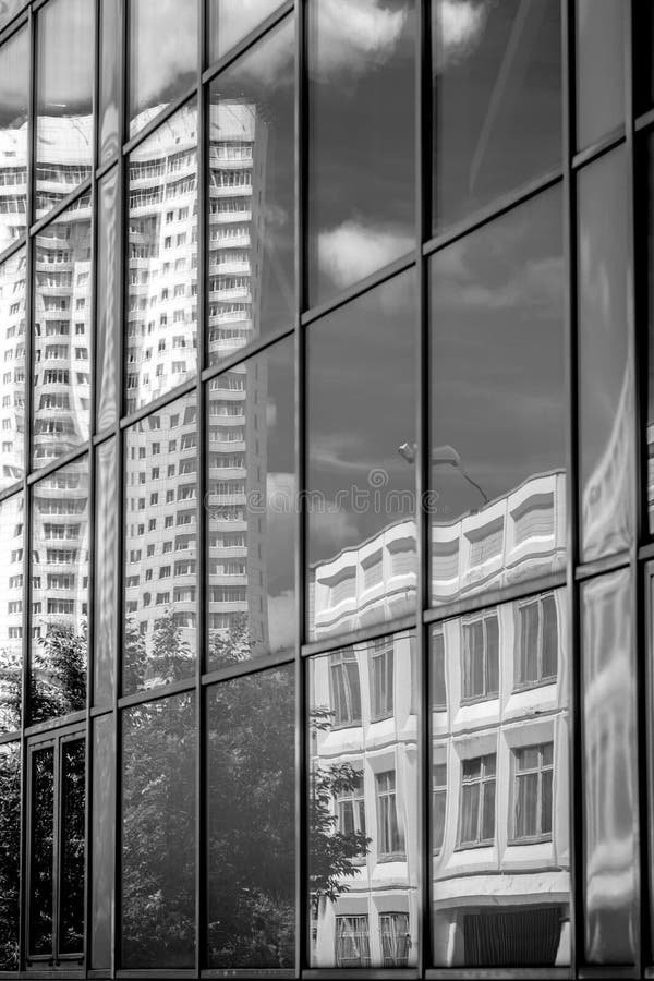 Reflection in the Windows of Another Building Black and White Vertical ...
