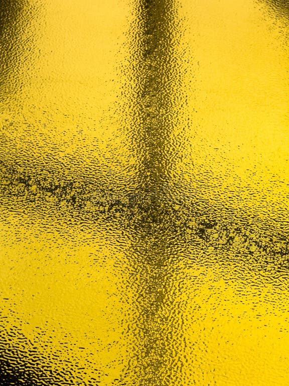 A Reflection of a Yellow Object on a Surface Stock Image - Image of ...