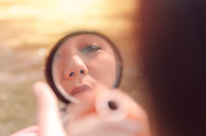Reflection of a Young Lady Putting on Her Make Up Stock Image - Image ...