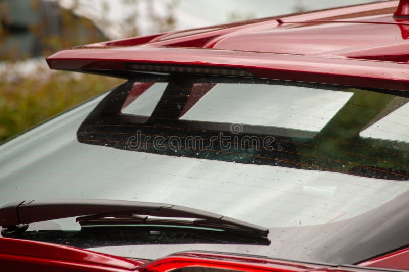 Reflections in Auto Glass on a Red Car Stock Photo - Image of wheel ...
