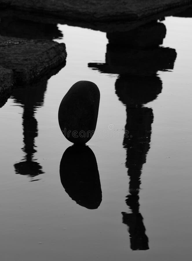 Reflections of Balanced Stones Editorial Photo - Image of skill ...