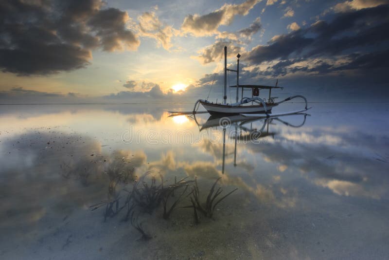 Reflections Boat at Sunrise on the Beach Stock Image - Image of morning ...