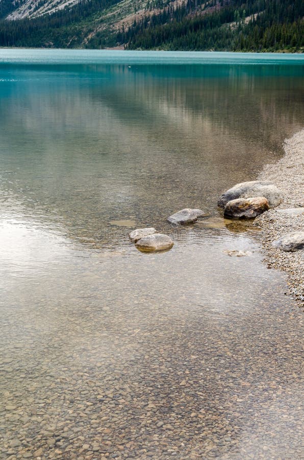 Reflections on Bow lake stock image. Image of nature - 47351521