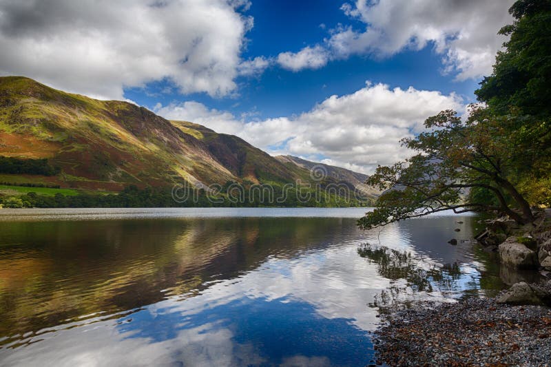 Reflections in Buttermere in Lake District Stock Photo - Image of ...